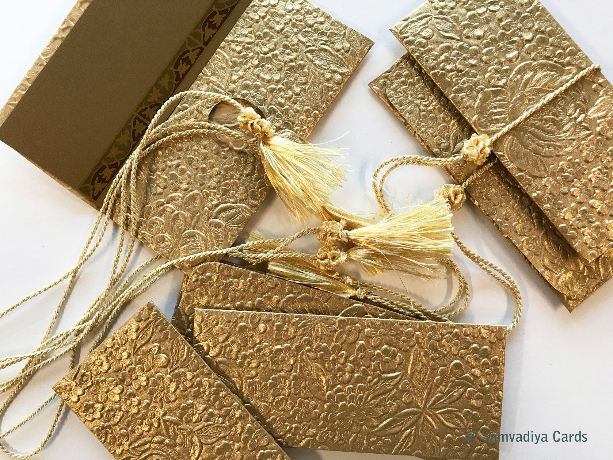 Money envelope assortment of gold and ivory embossed, paper Monetary e ...